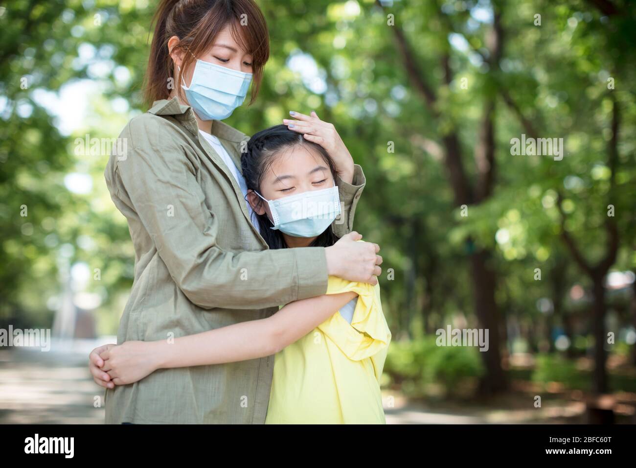 mother and child wear face mask during coronavirus and flu Stock Photo ...