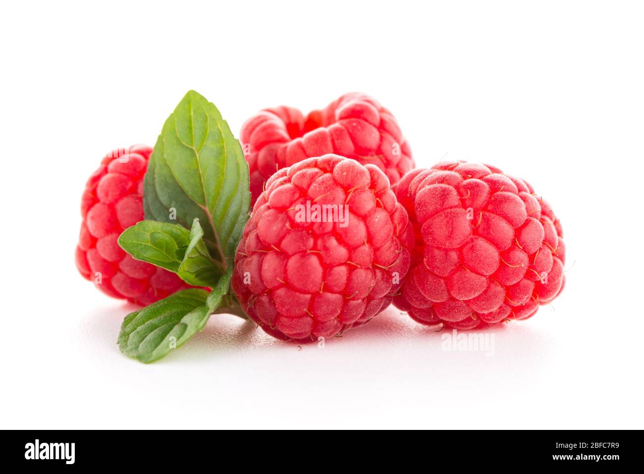Raspberry fruit isolated over white background Stock Photo - Alamy