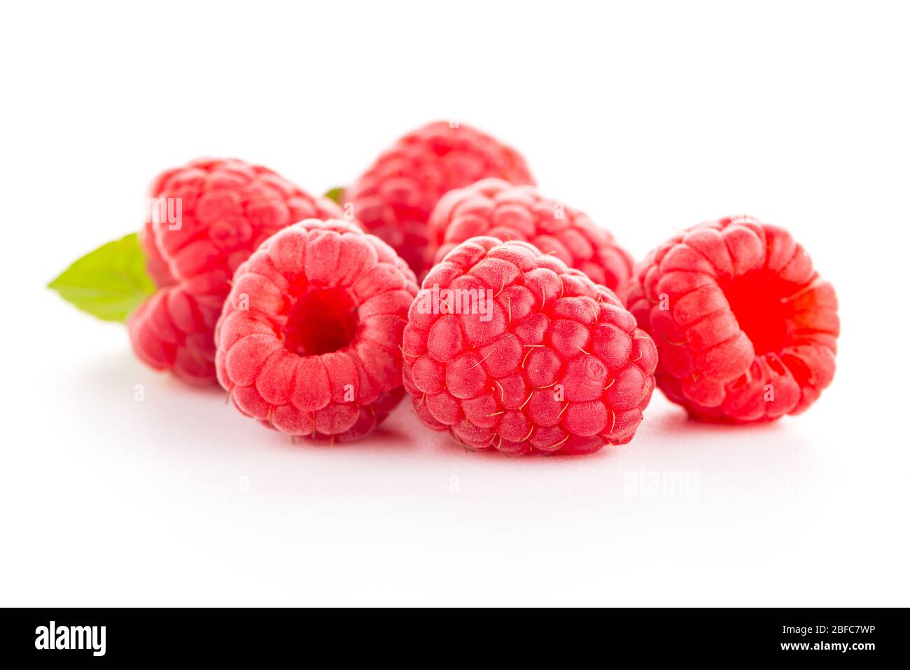Raspberry fruit isolated over white background Stock Photo - Alamy