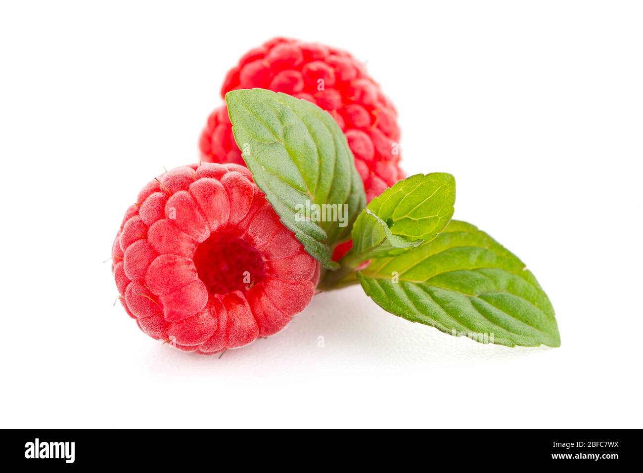 Raspberry fruit isolated over white background Stock Photo - Alamy