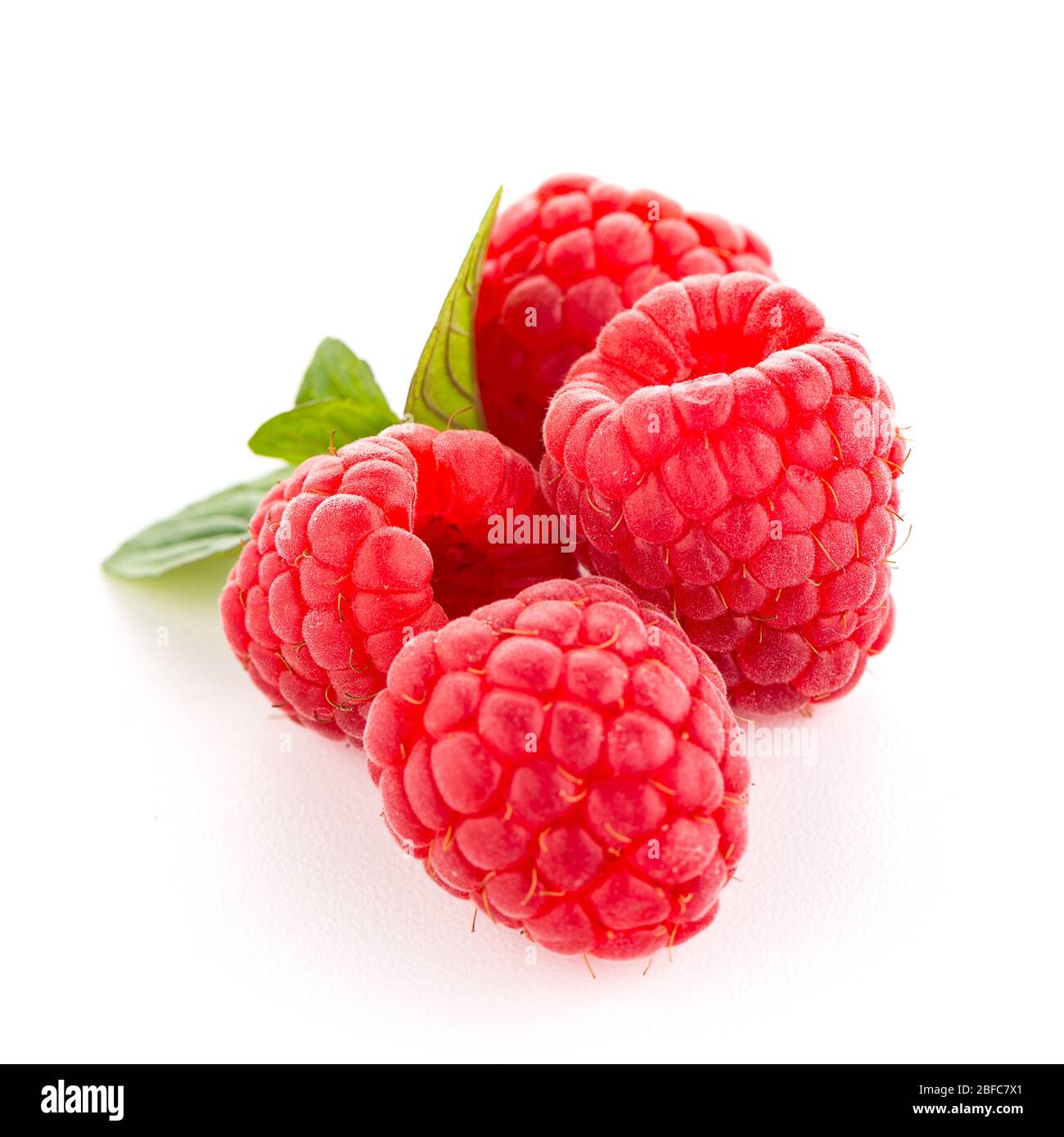 Raspberry fruit isolated over white background Stock Photo - Alamy