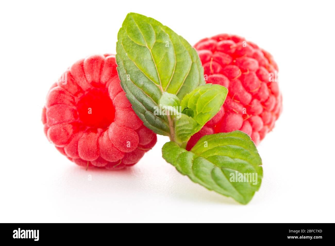 Raspberry fruit isolated over white background Stock Photo - Alamy