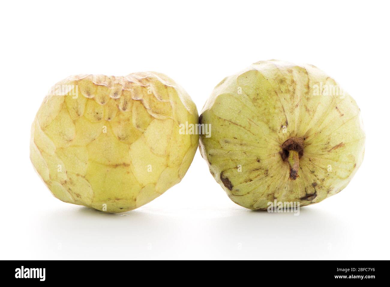 Custard apple, also known as Bullocks or Bulls Heart on white ...