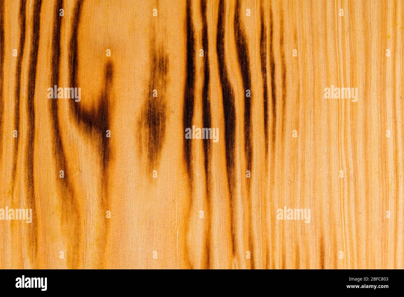 Background texture from burned brown pine wood Stock Photo - Alamy