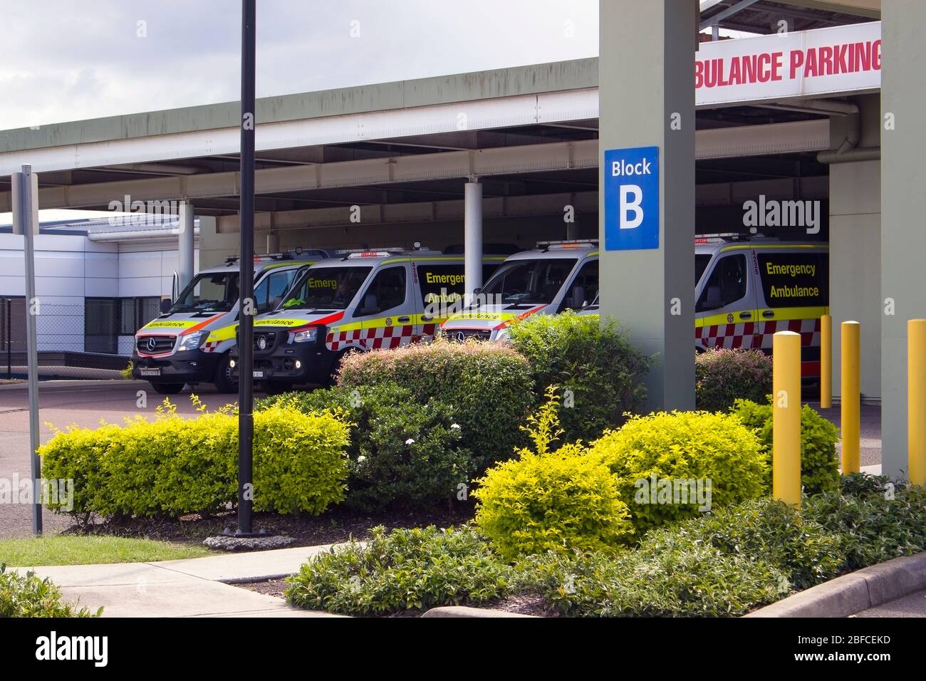 Line of Ambulances within a Hospital Parking garage, ready to respond ...