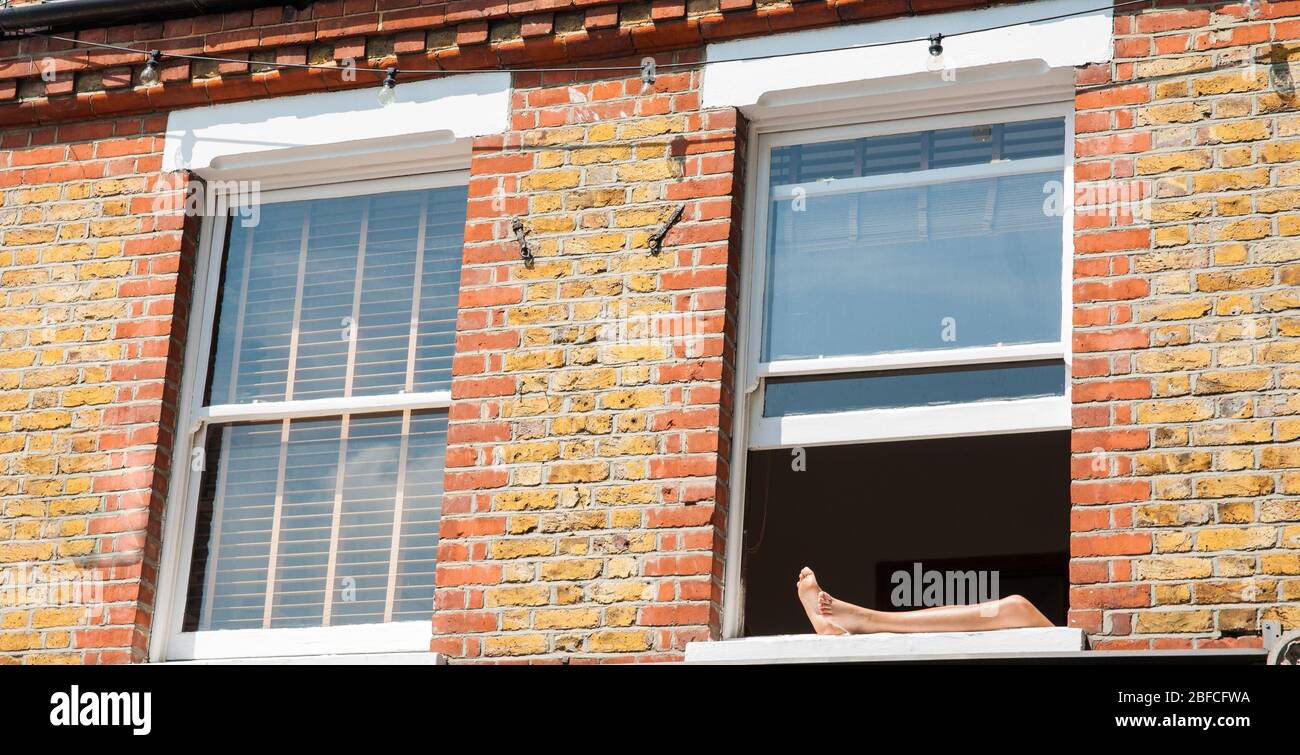 Feet on the windowsill hi-res stock photography and images - Alamy