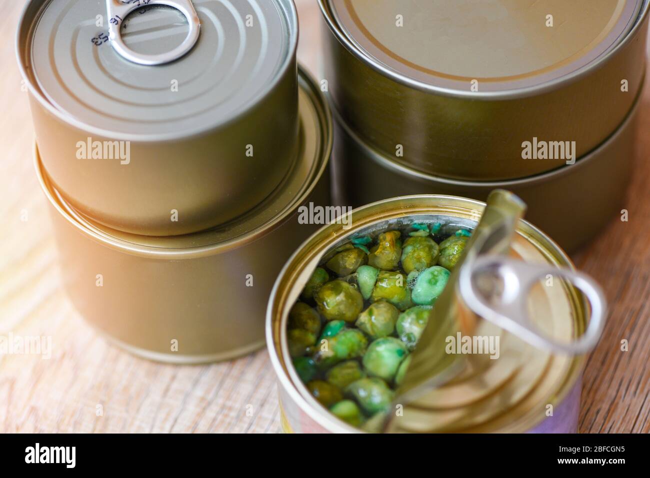 Canned food in metal can on wooden background , top view / canned goods ...