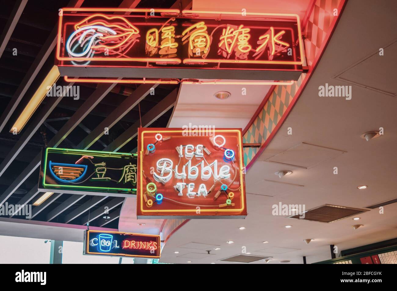 Neon signs advertising food and bubble tea in Hong Kong Stock Photo - Alamy