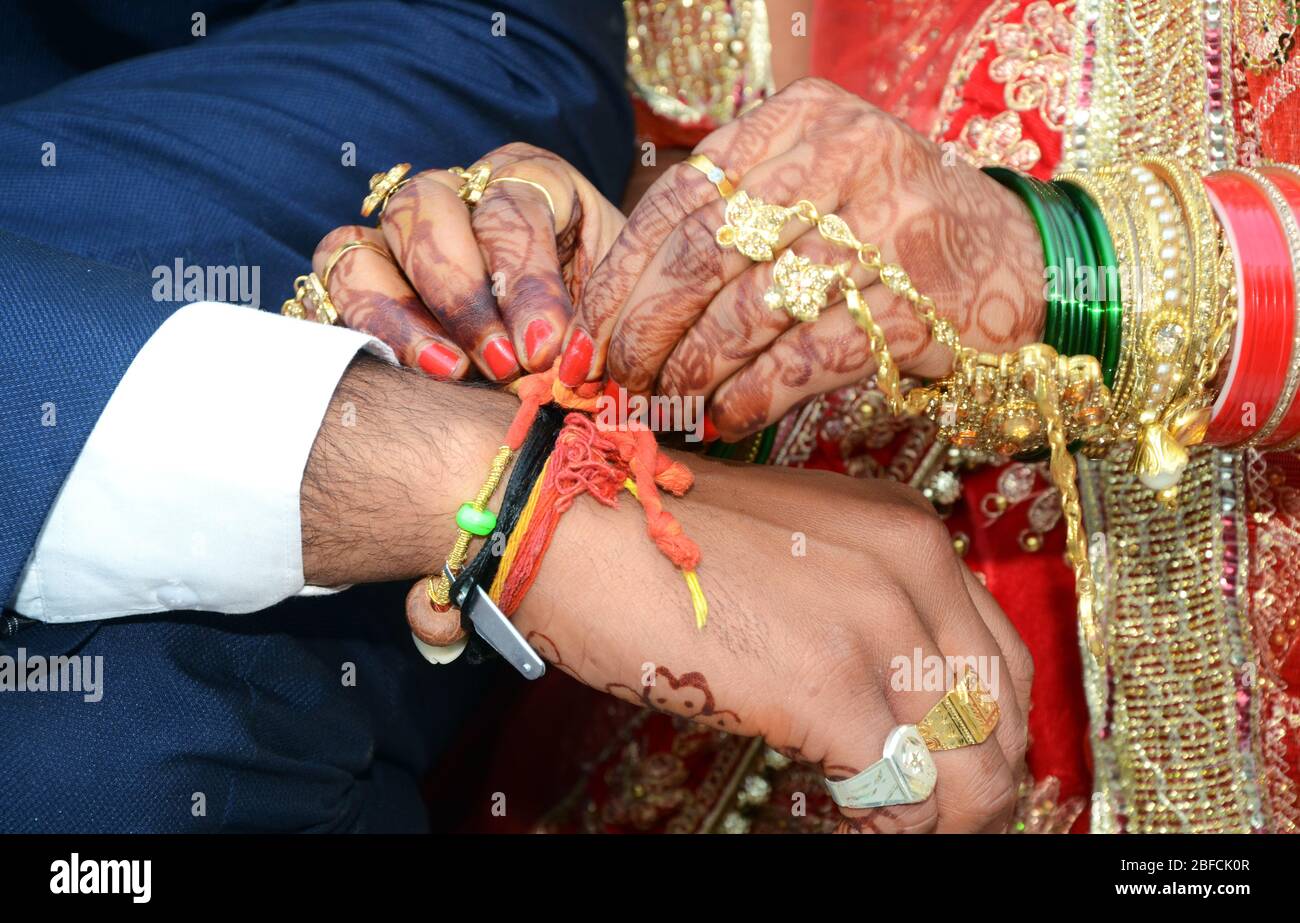 Indian couple playing Ring Fishing game in wedding ceremony of India ...