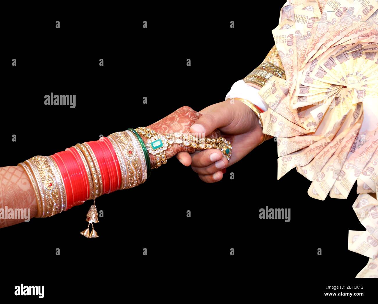 Bride & Groom Hand's Together in Indian Wedding Stock Photo - Alamy