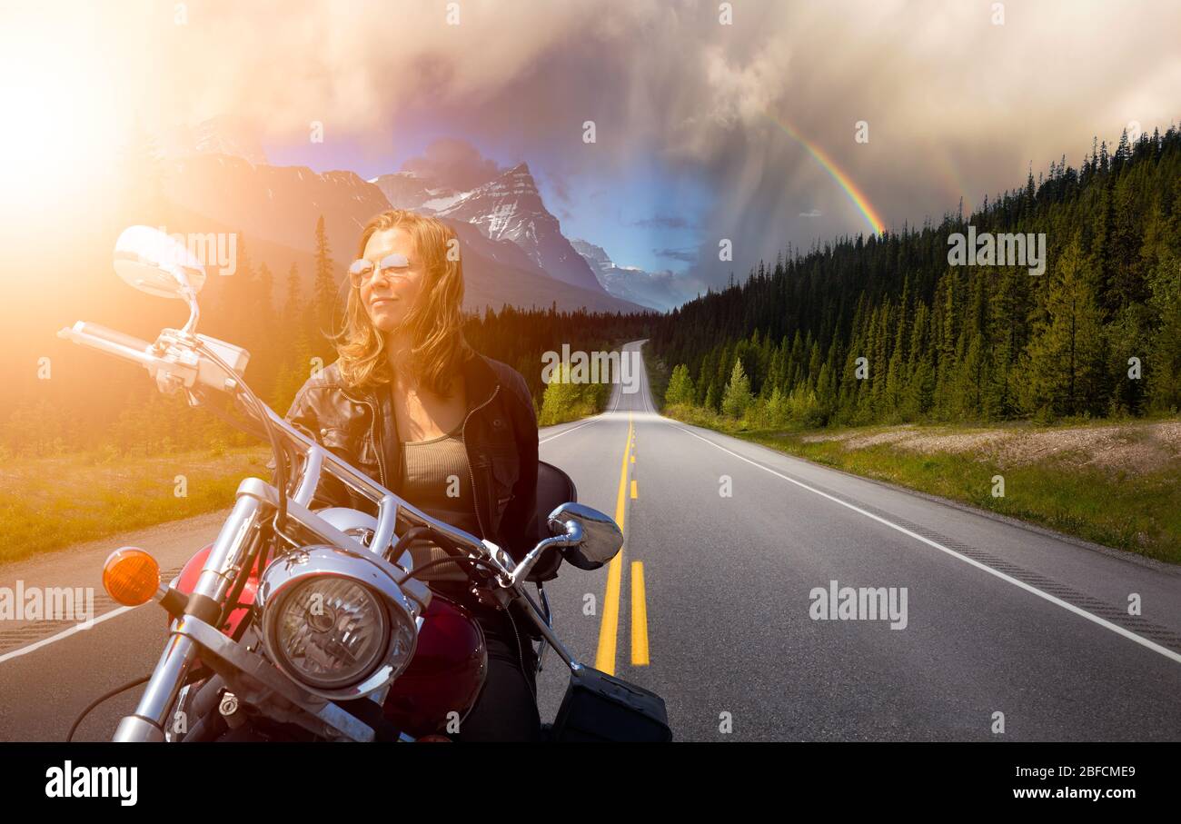Biker Woman on a Motorcycle on a scenic Road Stock Photo - Alamy