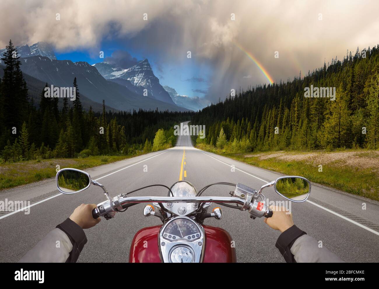 Biker Riding on a Motorcycle on a scenic Road Stock Photo - Alamy