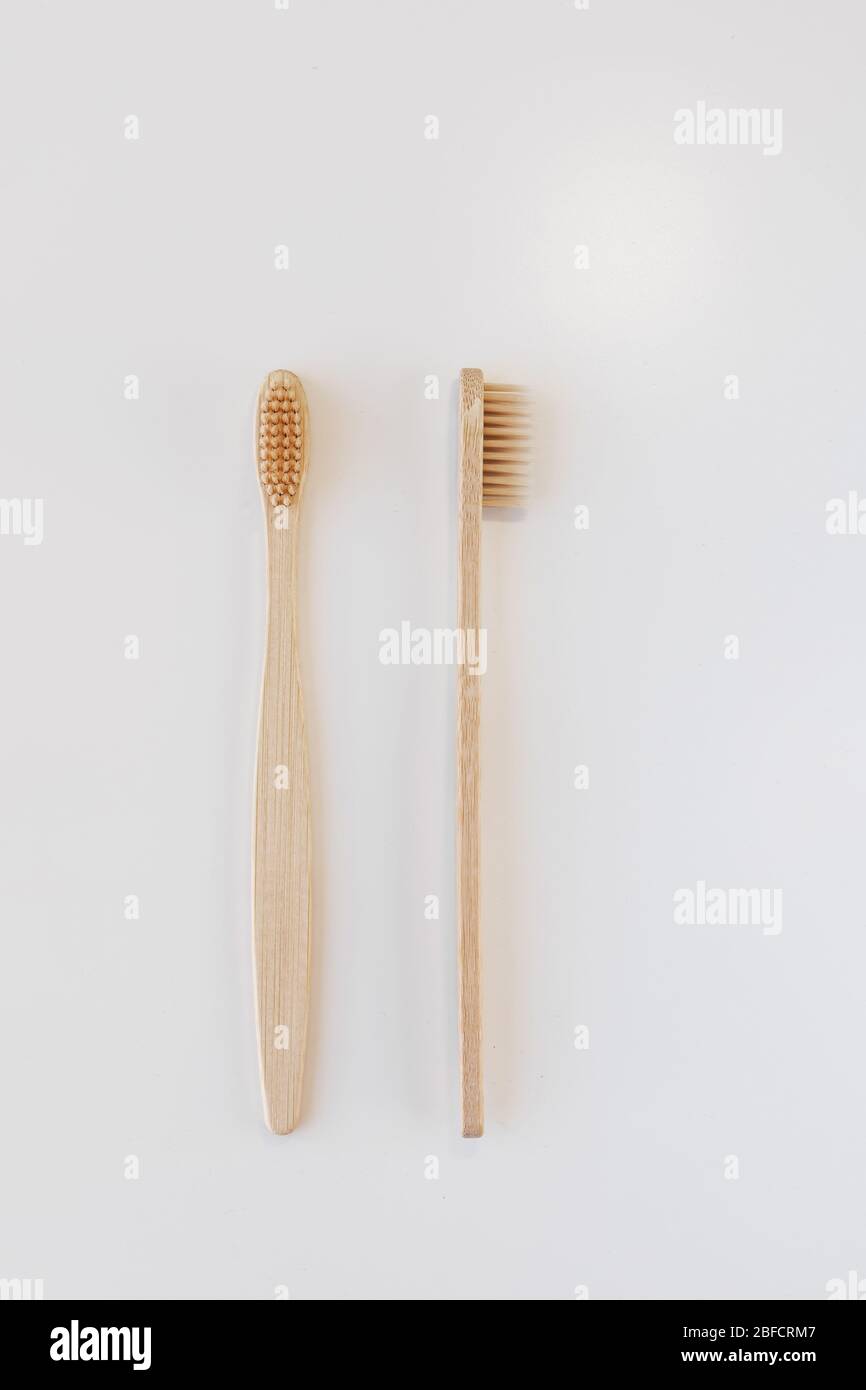 View of bamboo toothbrush front and side. Vertical orientation. Dental ...