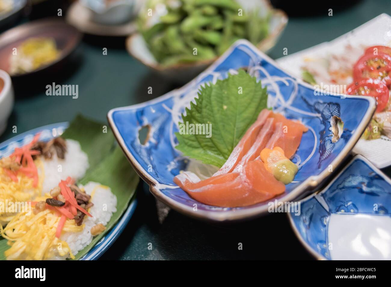 Delicious Japanese salmon sashimi slices, it's raw fish, served with ...