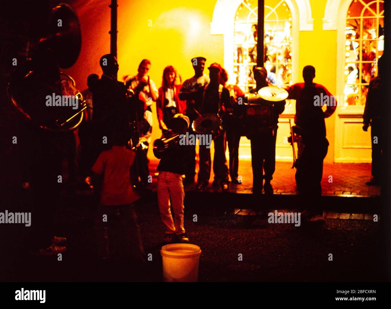 Jazz group busking on sidewalk in French Quarter, New Orleans ...