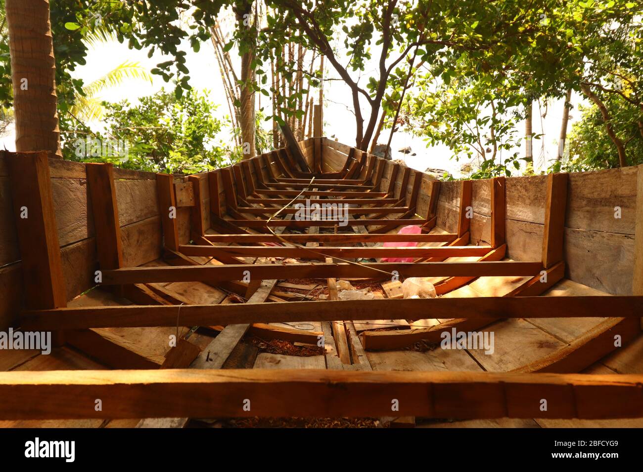 A traditional Cambodian or Khmer boat called Bon Om Touk being repaired ...