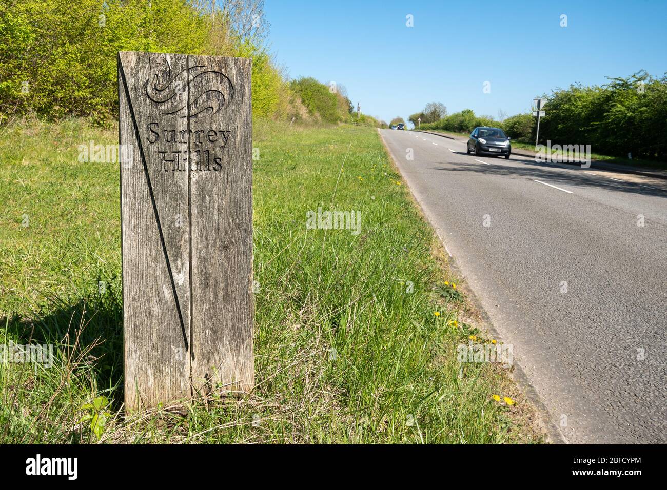 Surrey Hills AONB wooden sign, UK, at the side of a country road Stock ...