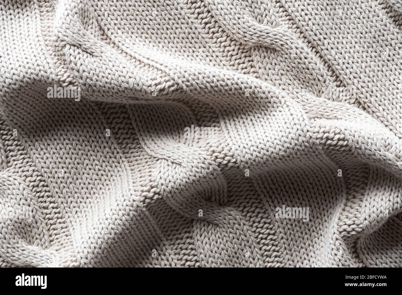 Texture gray knitted fabric with a pattern Stock Photo - Alamy