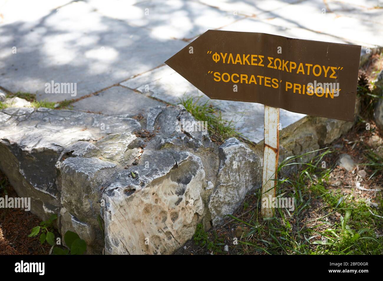 Socrates prison sign at Athens Stock Photo - Alamy