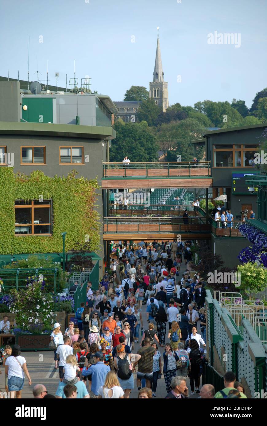 Visitors walk around the busy grounds during the Wimbledon 2019 Tennis ...