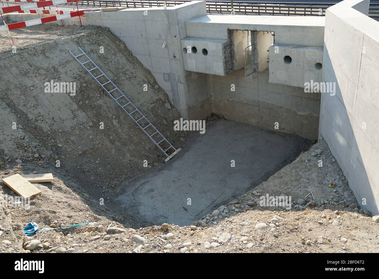 construction pit or shaft on a civil engineering construction site with ...
