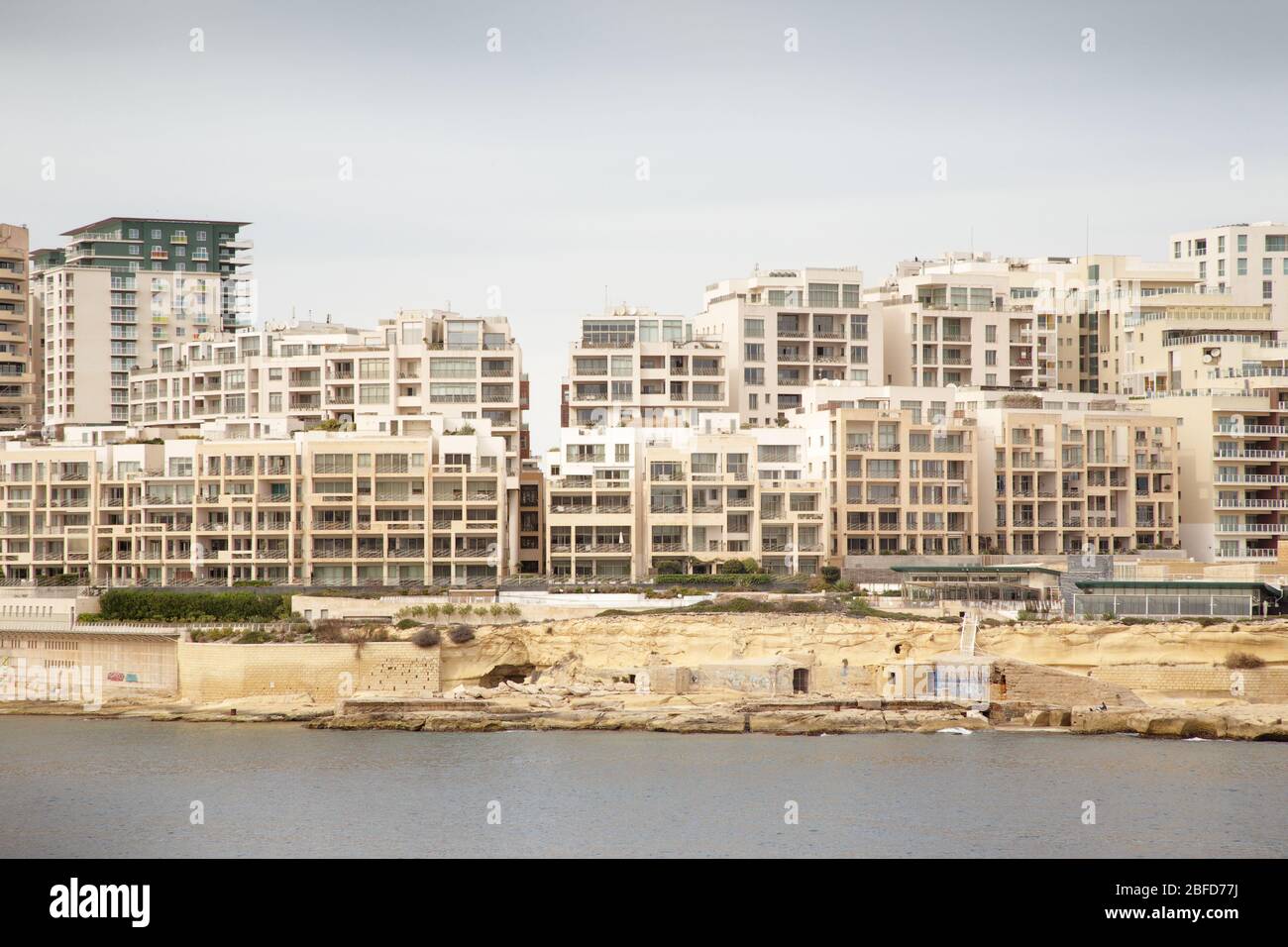landscape view of a cityscape malta of all the high rise buildings ...