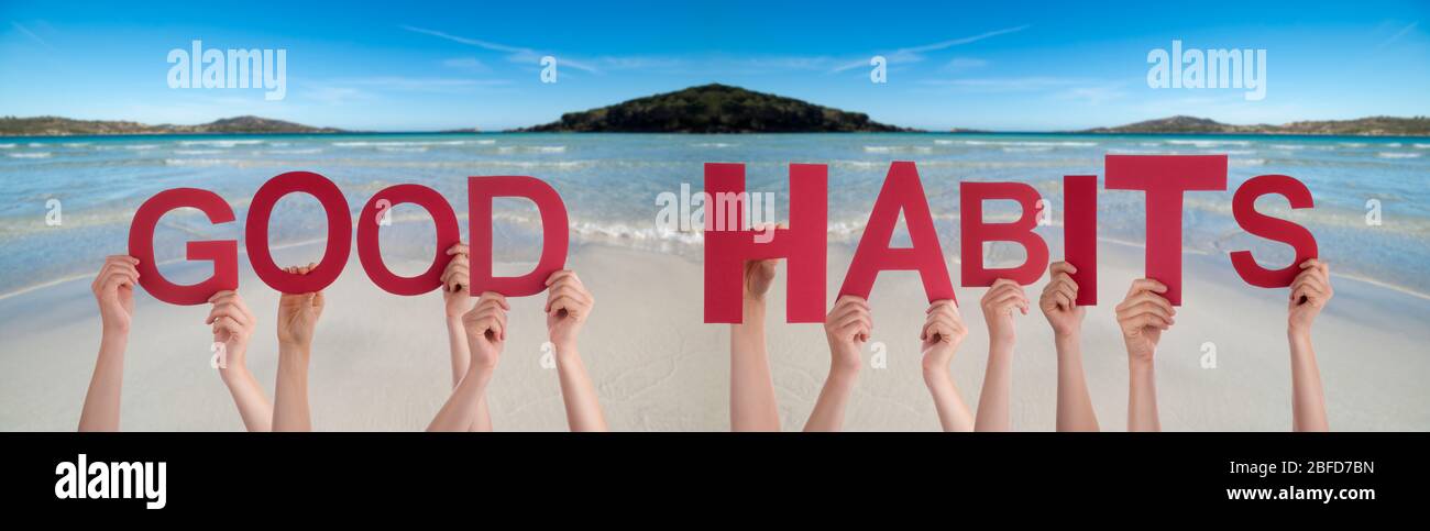 People Hands Holding Word Good Habits, Ocean Background Stock Photo - Alamy