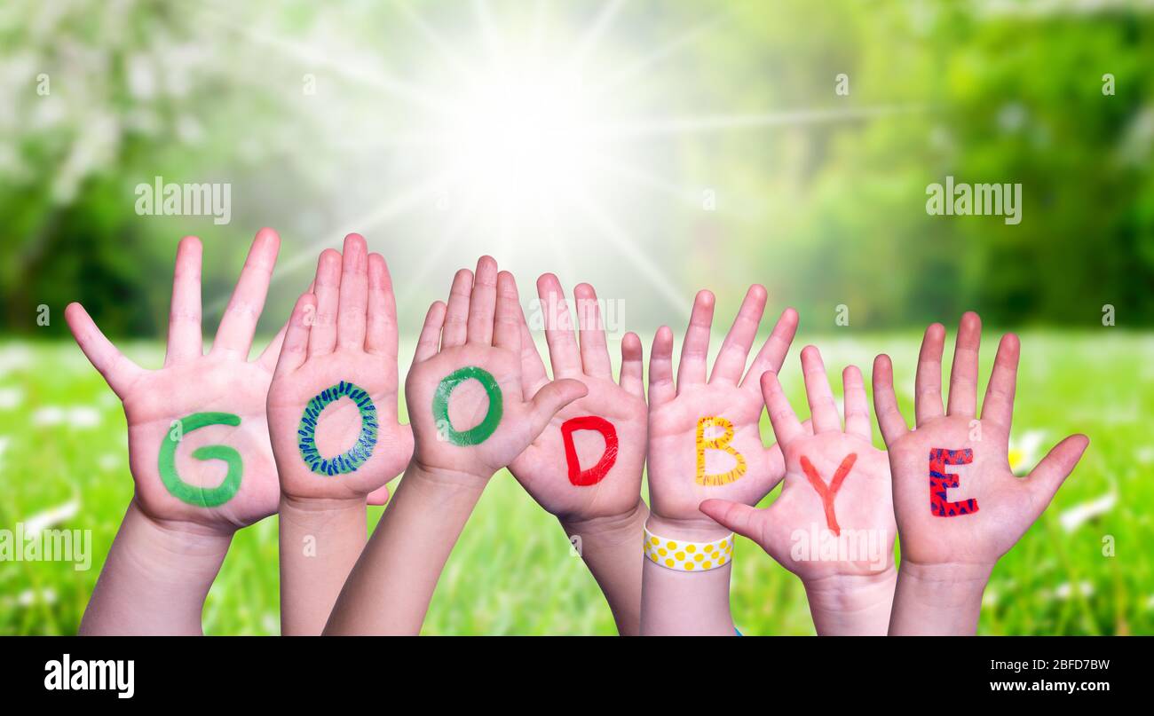 Children Hands Building Word Goodbye, Grass Meadow Stock Photo - Alamy