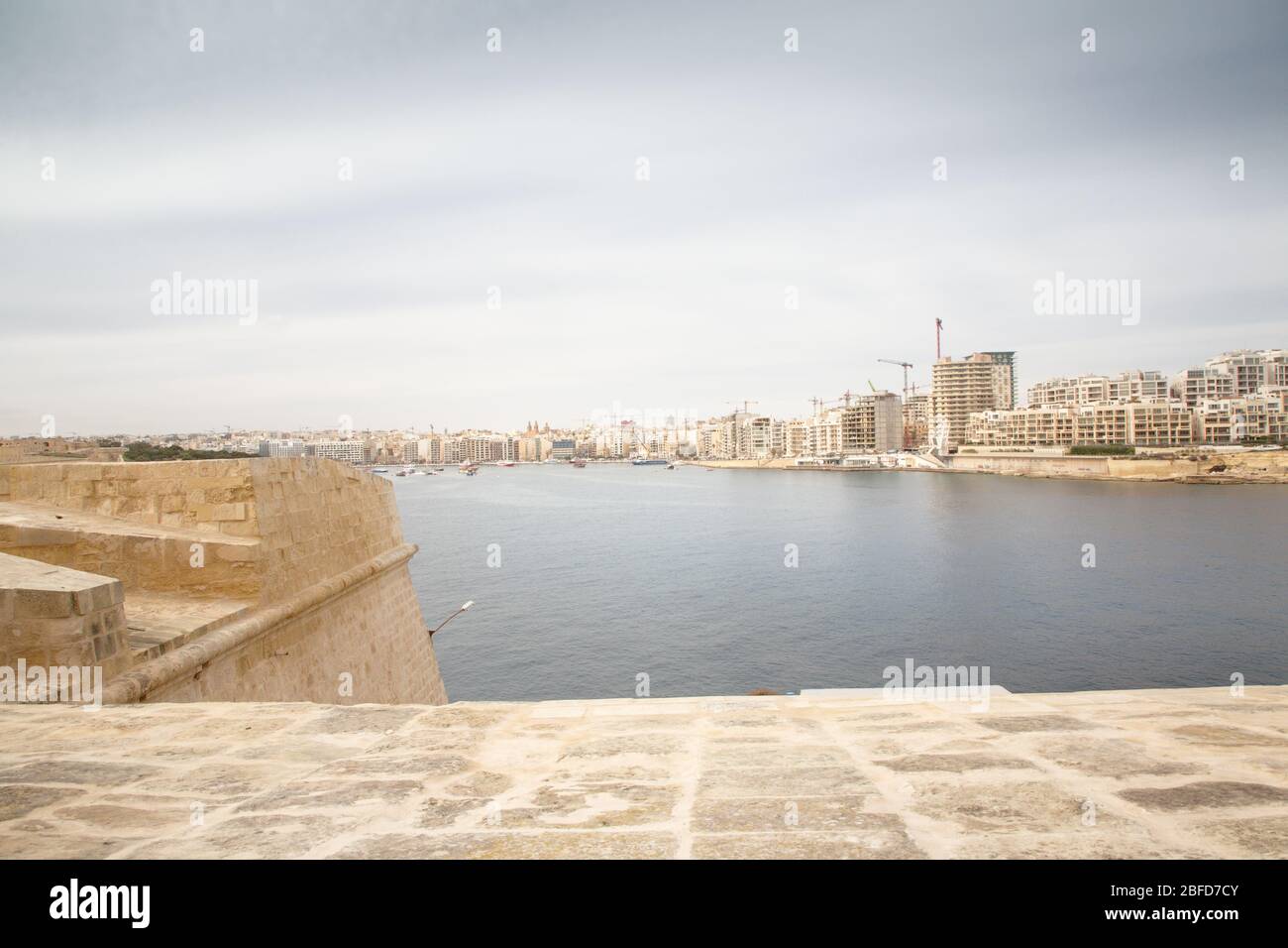 landscape view of a cityscape of malta of all the high rise buildings ...