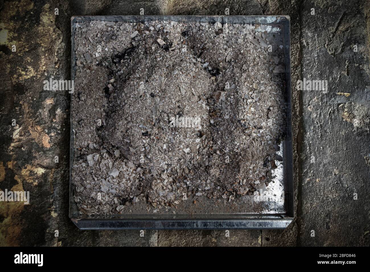 Ash tray from a wood burner Stock Photo - Alamy