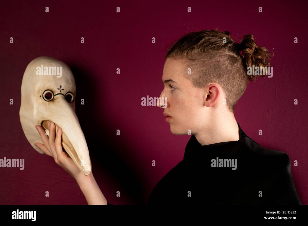 Young boy with plague doctor mask Stock Photo - Alamy