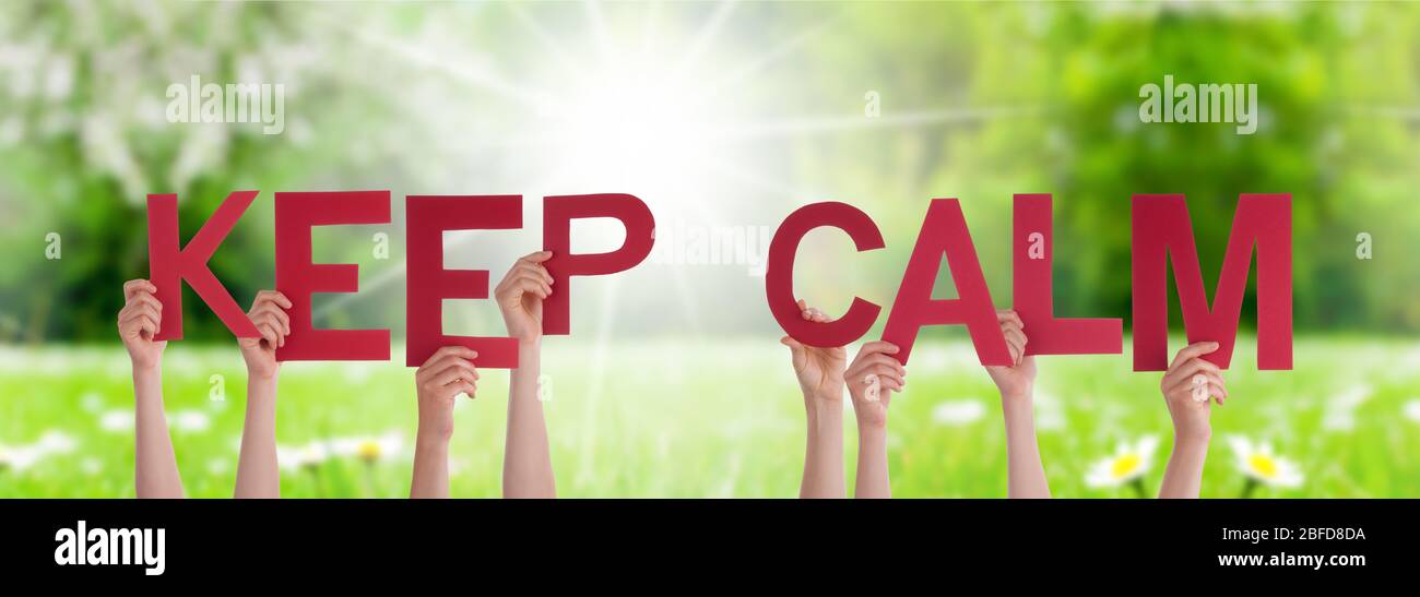 People Hands Holding Word Keep Calm, Grass Meadow Stock Photo - Alamy