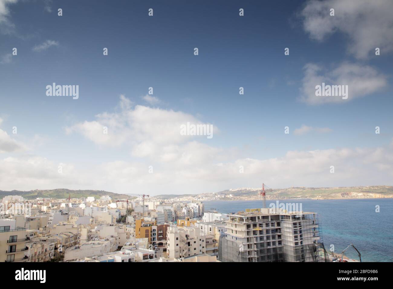 landscape view of a cityscape malta of all the high rise buildings ...