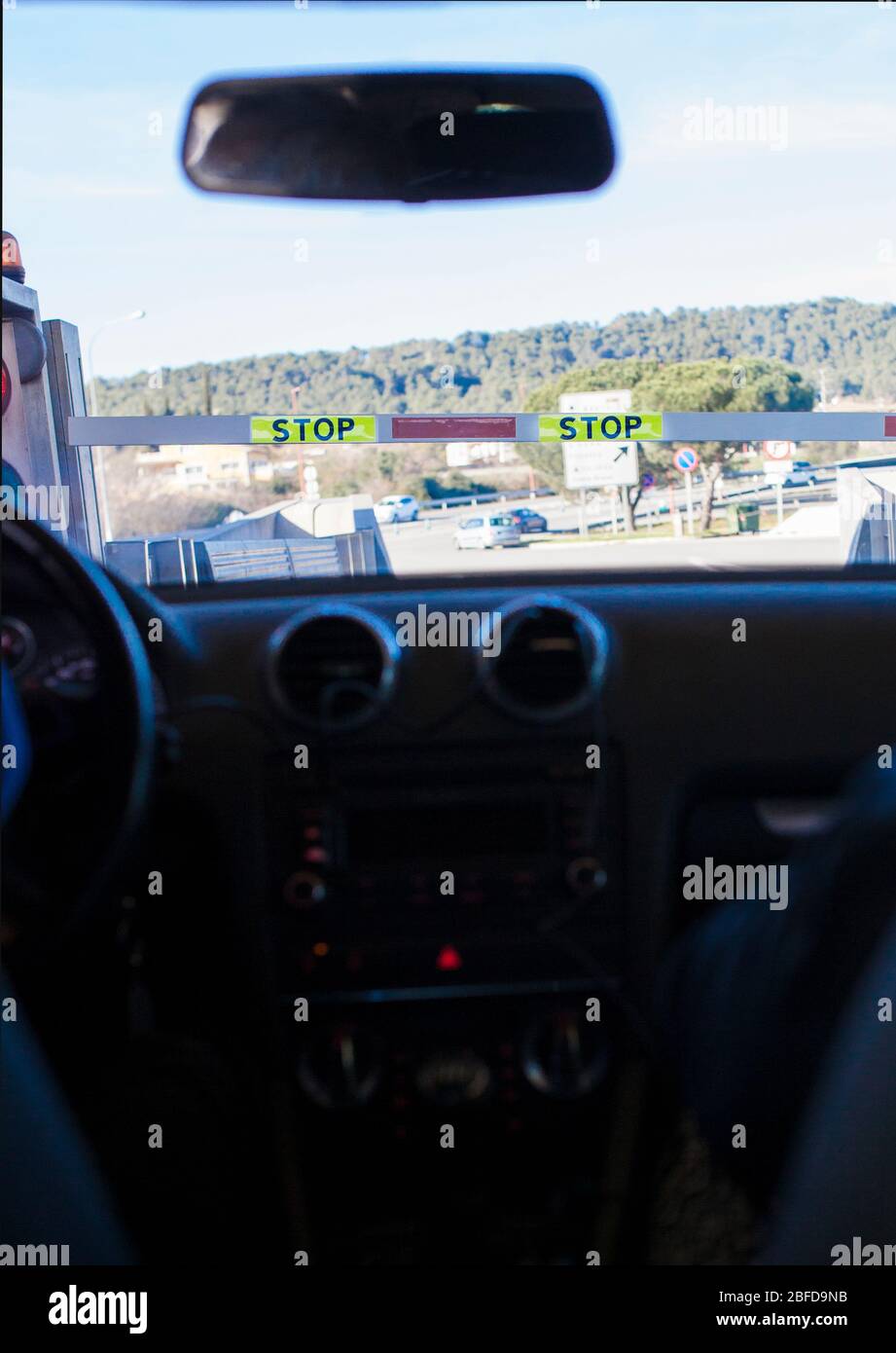 Entrance barrier of toll gate. Inside car view Stock Photo - Alamy