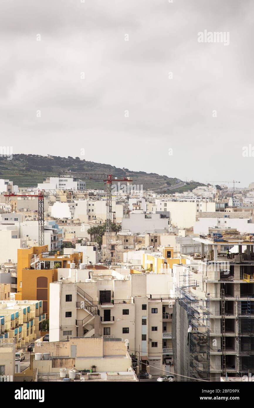 landscape view of a cityscape malta of all the high rise buildings ...