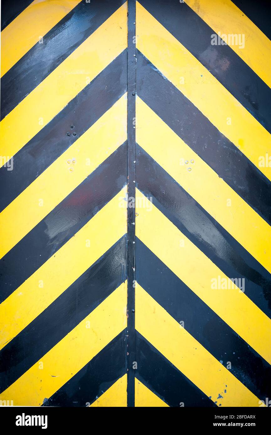 Black and yellow stripes in an eye-catching full frame hazard ...