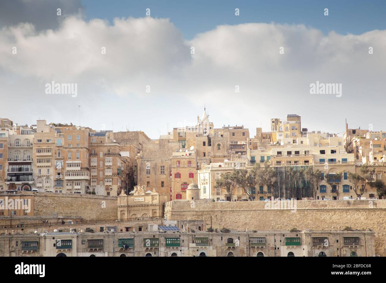 landscape view of a cityscape malta of all the high rise buildings ...
