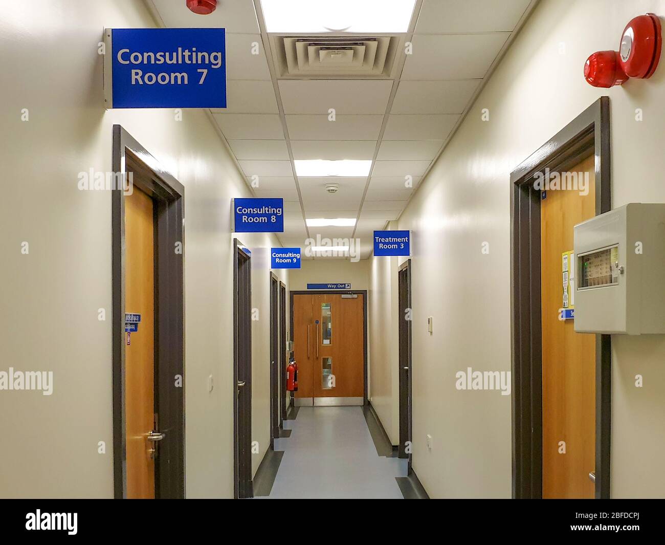 A typical British NHS hospital corridor showing consultation and ...