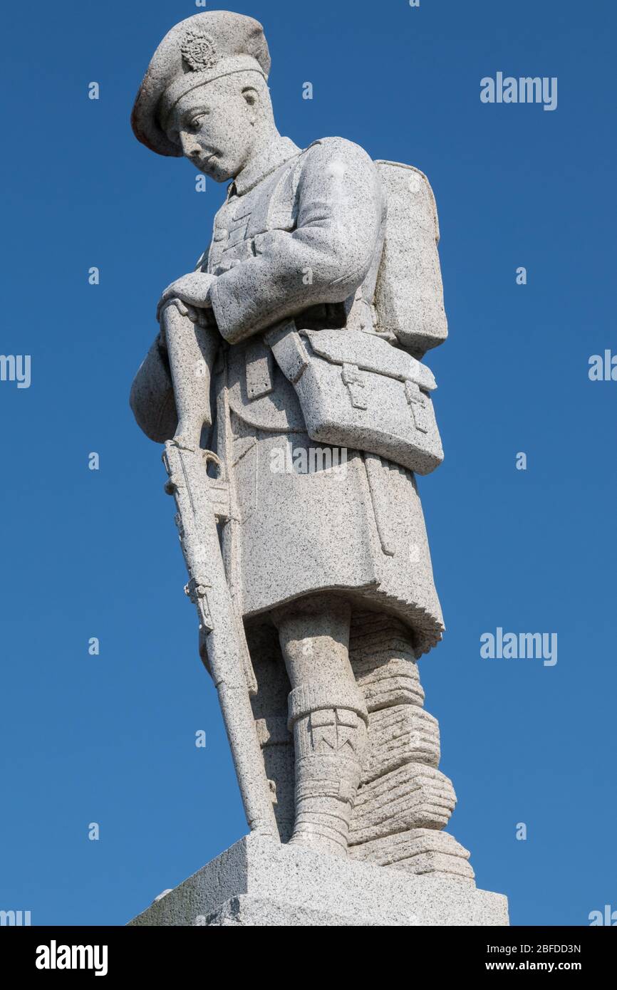Statue of a soldier, war memorial in Port Ellen, a picturesque little ...