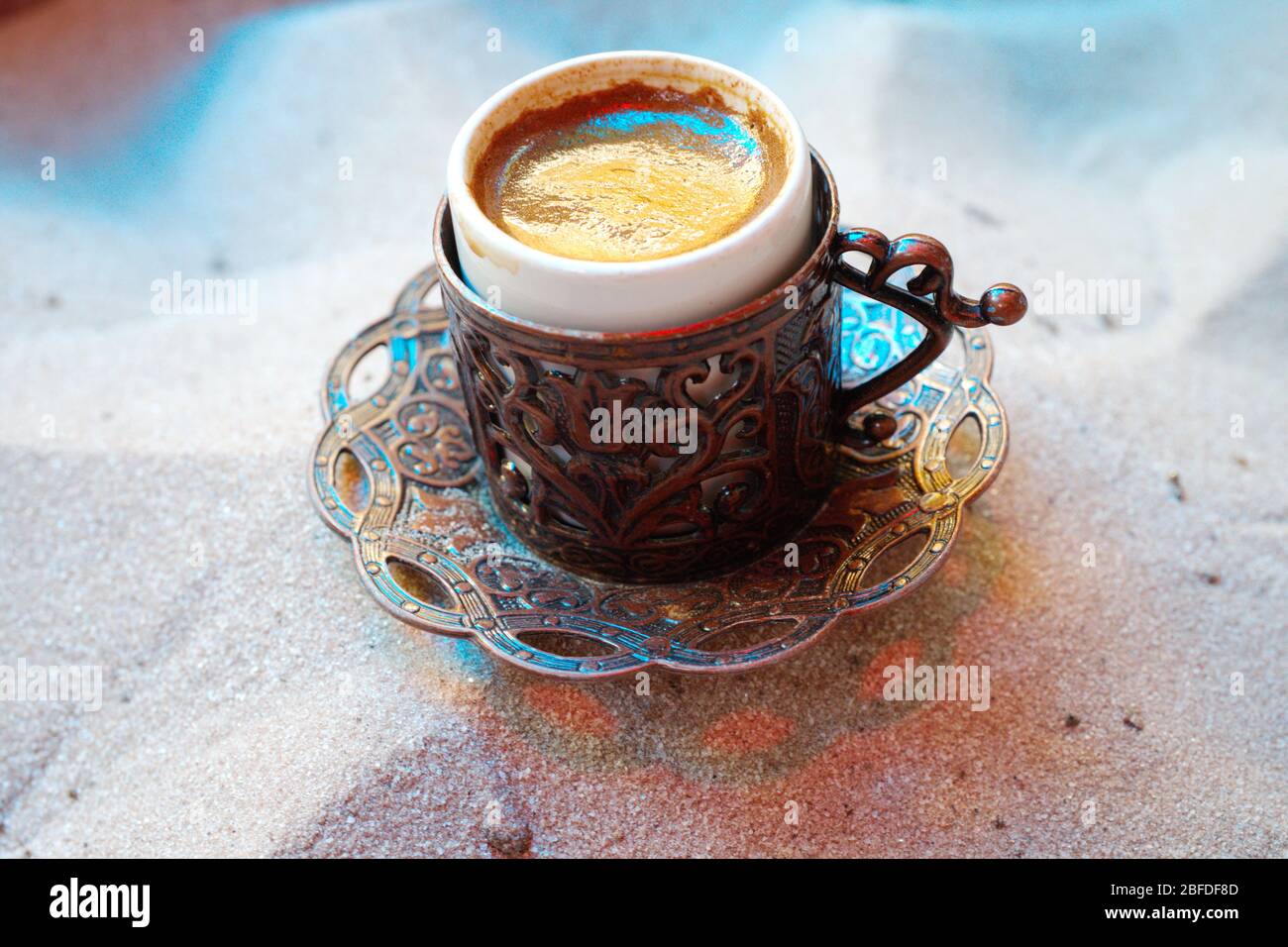 Turkish coffee culture coffee in the sand. cooking coffee on the sand ...