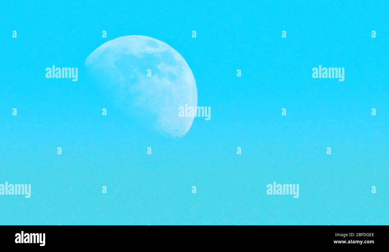 Lunar photography. Picture of a moon during a daylight. Sunset in the ...