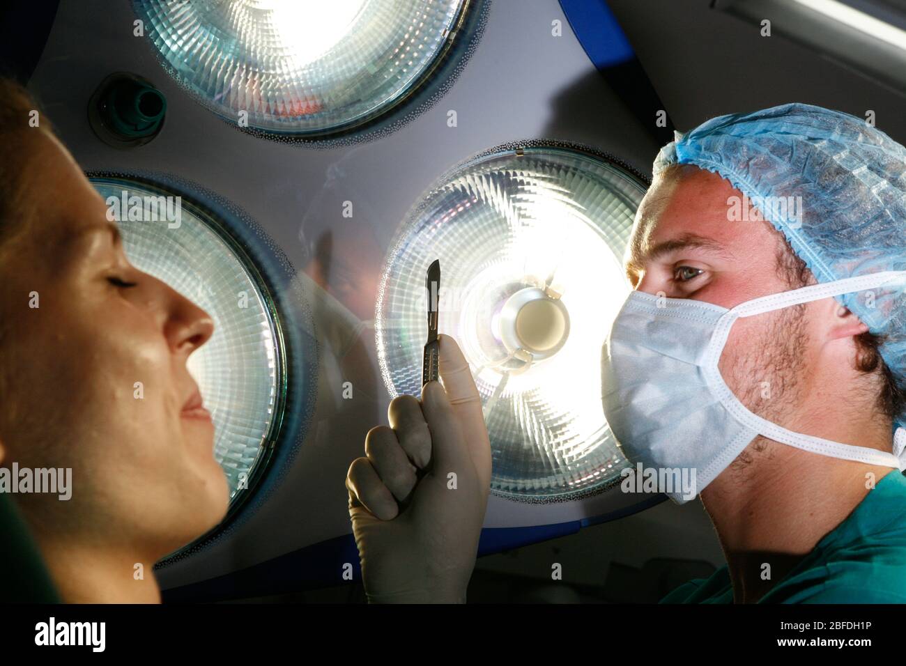 Surgeon prepares to make the first incision Stock Photo - Alamy