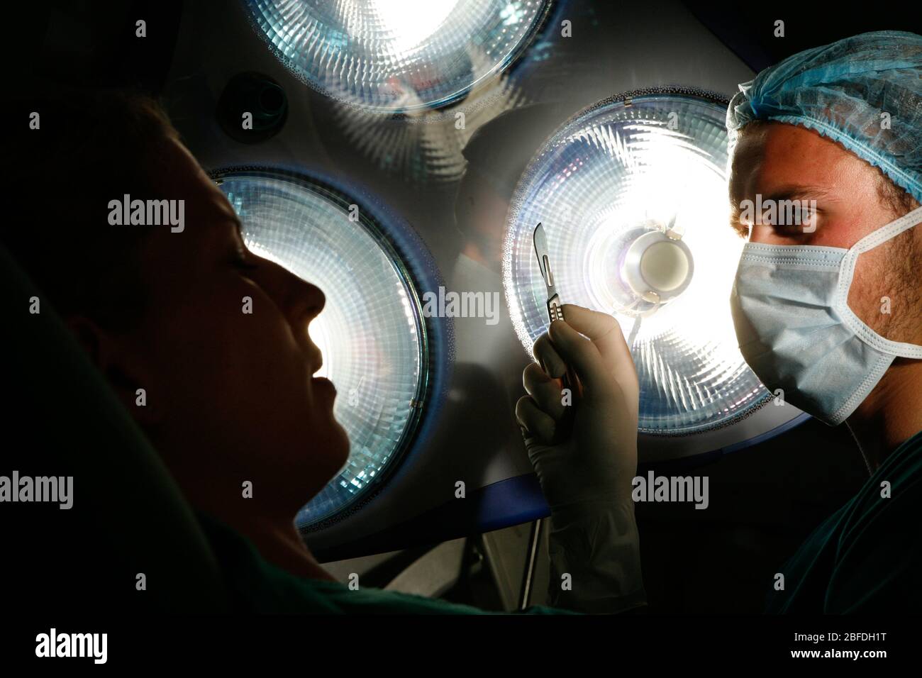 A male surgeon prepares to make the first incision Stock Photo - Alamy