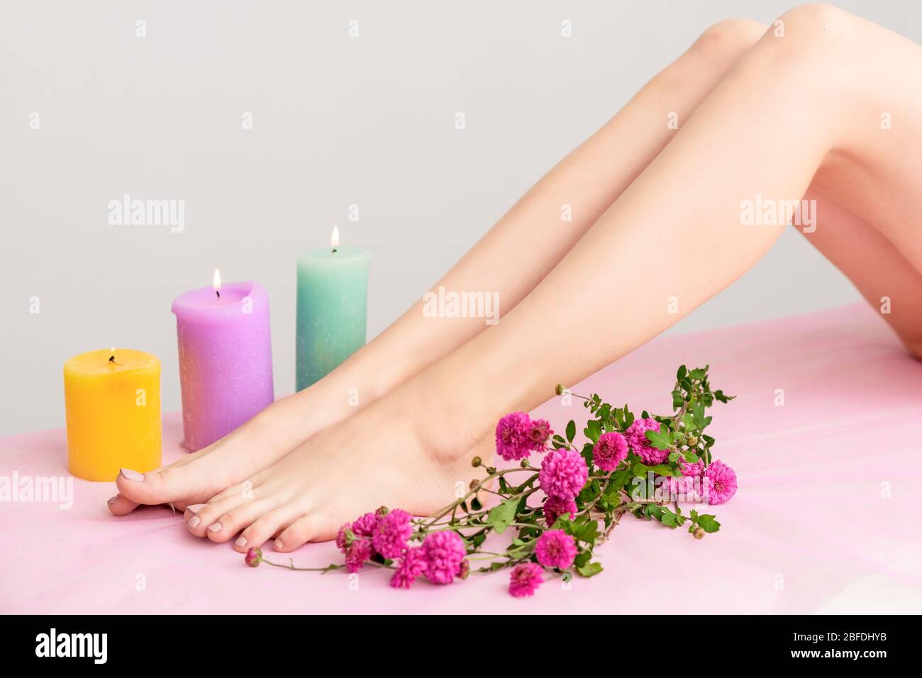 Beauty legs woman flowers hand hi-res stock photography and images - Alamy
