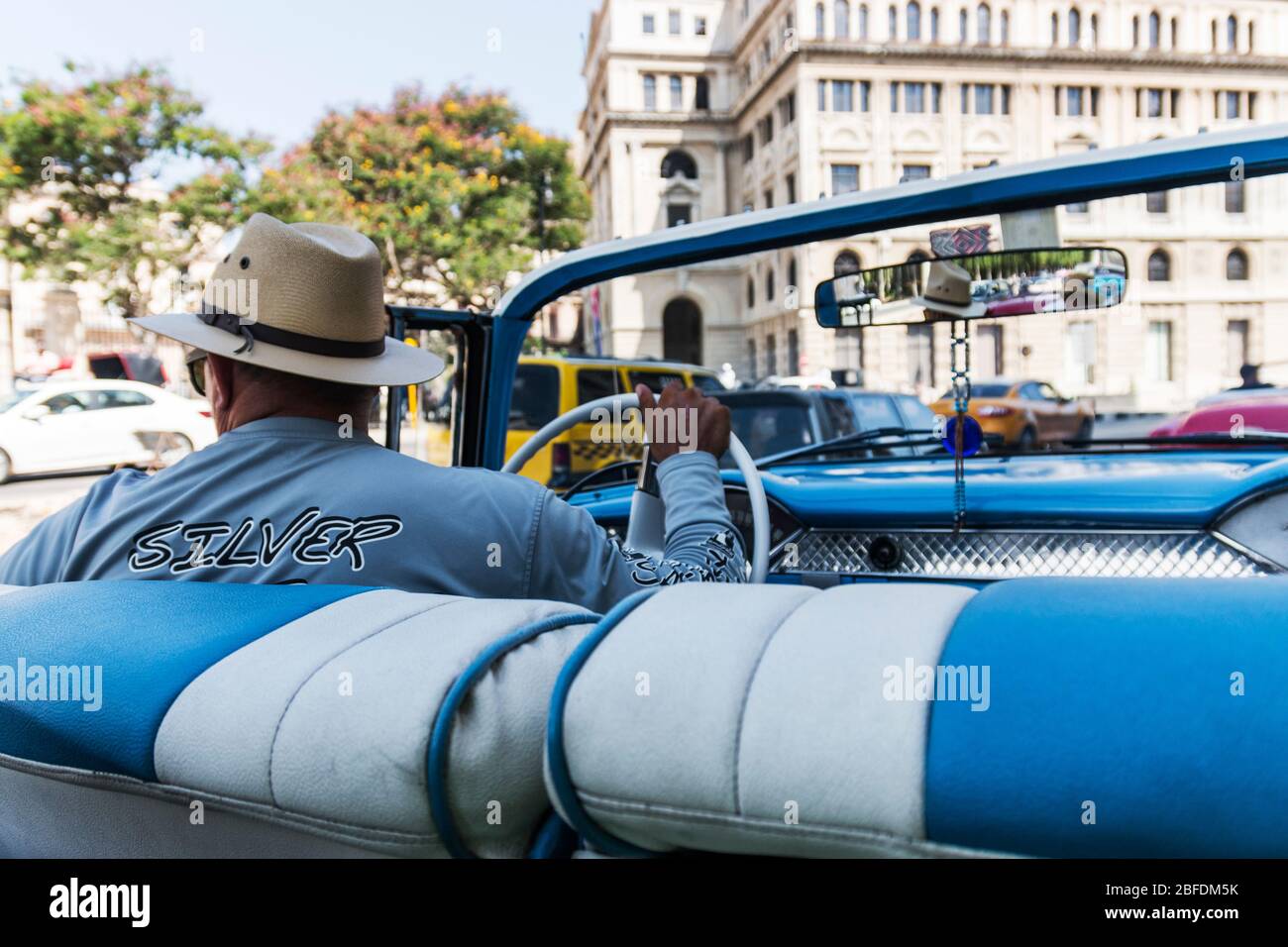 Havana, Cuba - 26 July 2018: The owner of a classic chevy belair ...