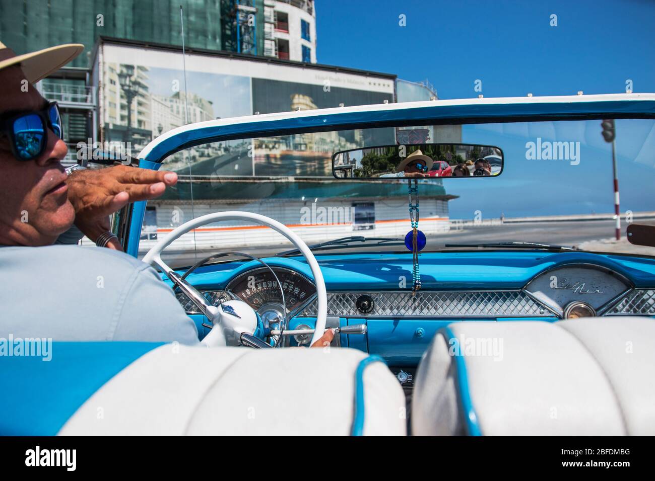 Havana, Cuba - 27 July 2018: Our Cuban taxi driver becoming tour guide ...