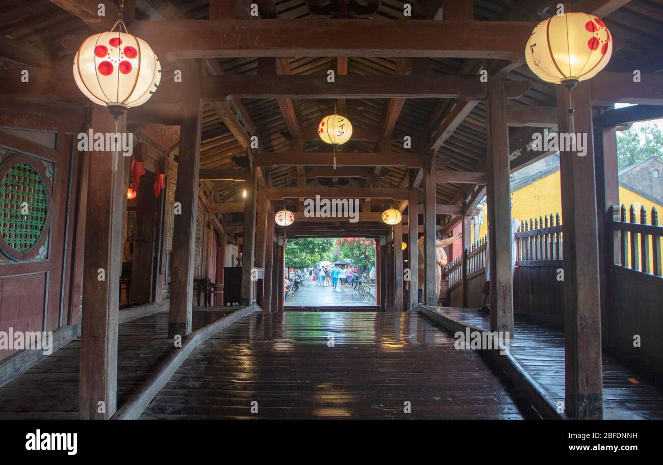Traditional hand painted silk lanterns hanging from the covered ...