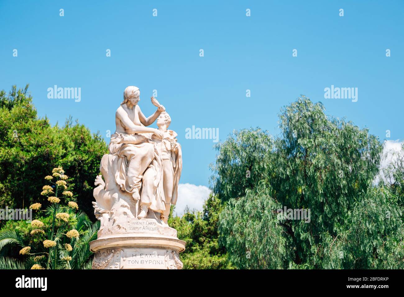Athens, Greece - August 6, 2019 : Statue of Lord Byron with green trees ...