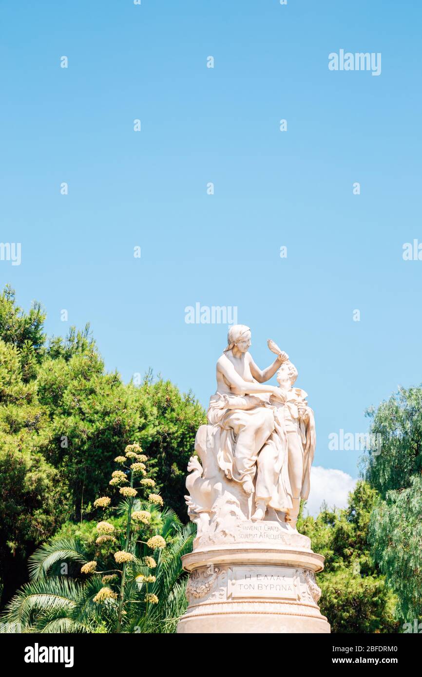 Athens, Greece - August 6, 2019 : Statue of Lord Byron with green trees ...