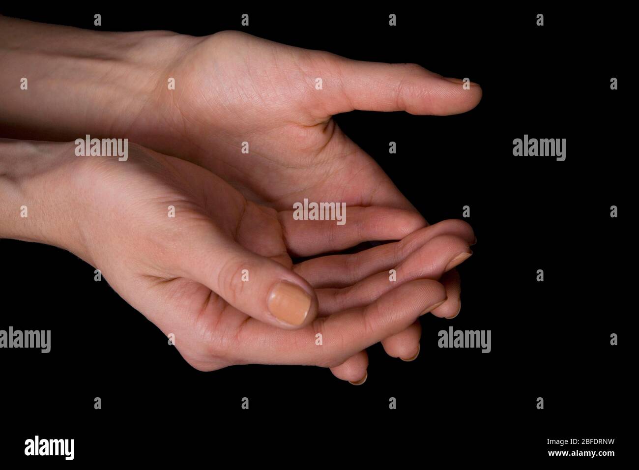 Close up of a woman's cupped hands -Model Released Stock Photo - Alamy